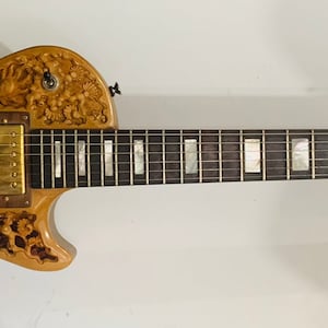 Handmade Dragon Electric Guitar: Balinese Carved Mahogany With Ruby - Etsy