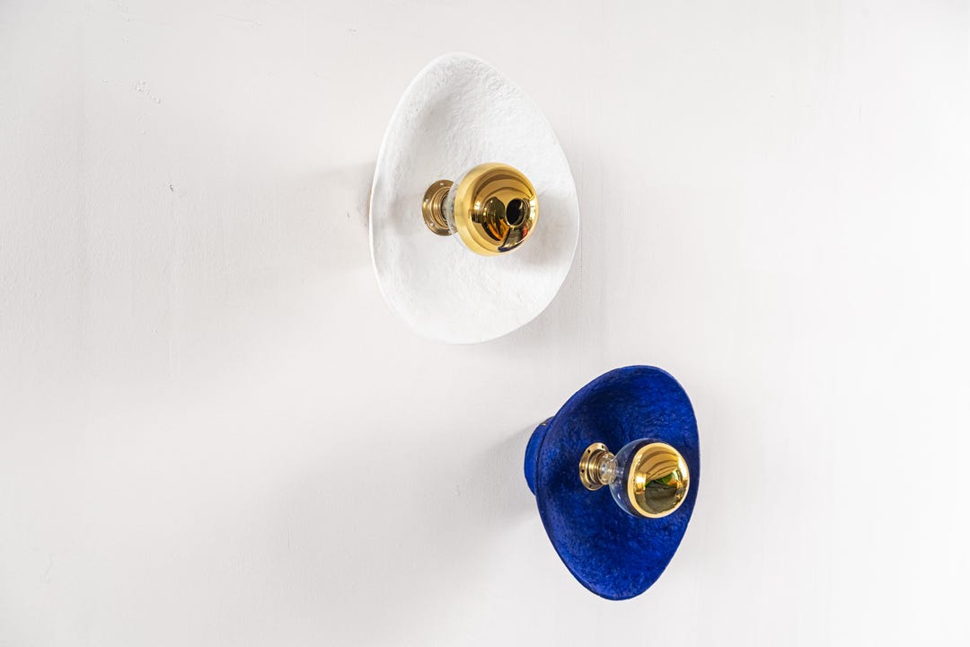 Ova Wall Lamp: Rounded Oyster Shape Paper Mache Lamp With Golden Light ...
