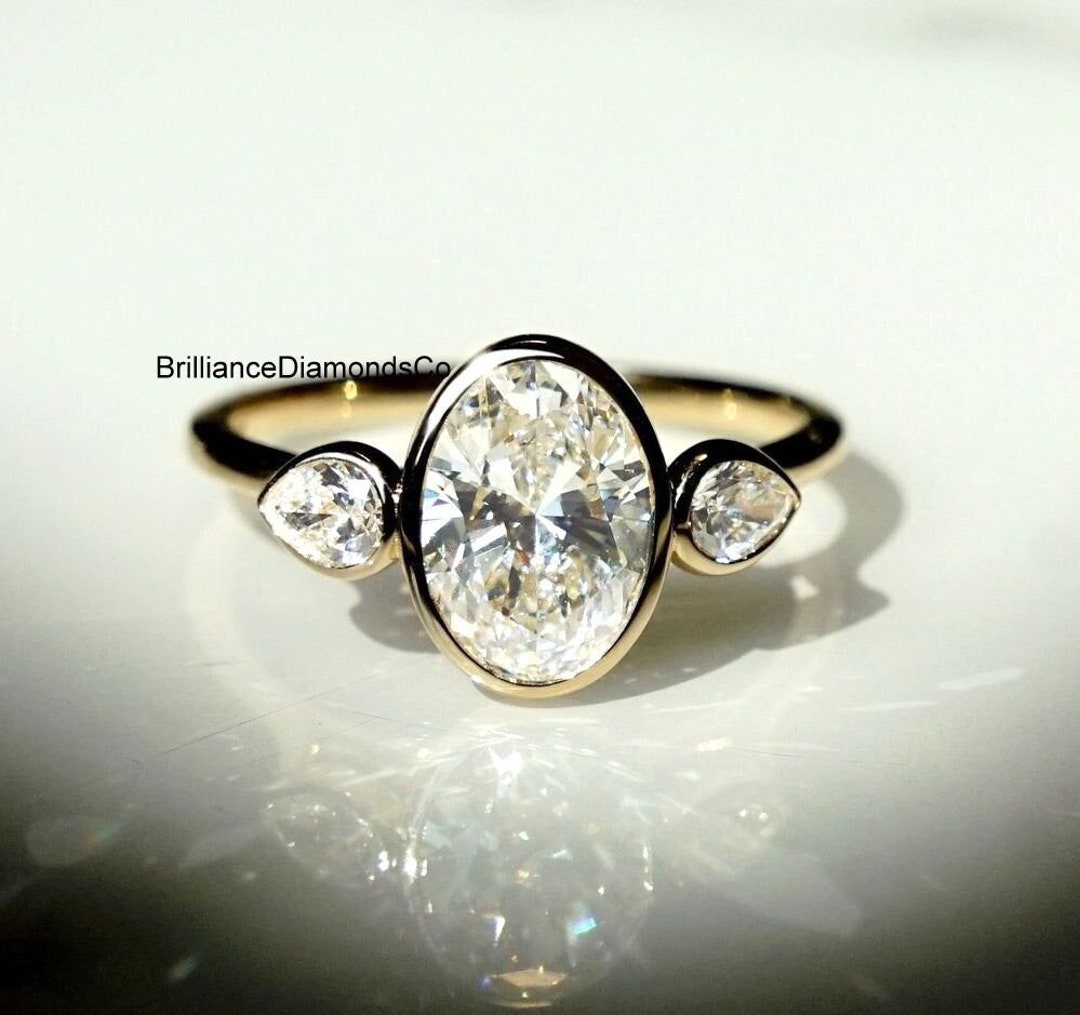 Bezel Set Look Stunning When Paired With This 12X8 Mm Oval Cut ...