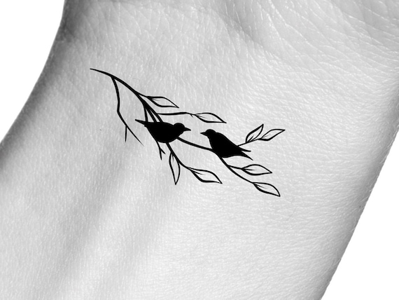 Two Birds On A Branch Tattoo