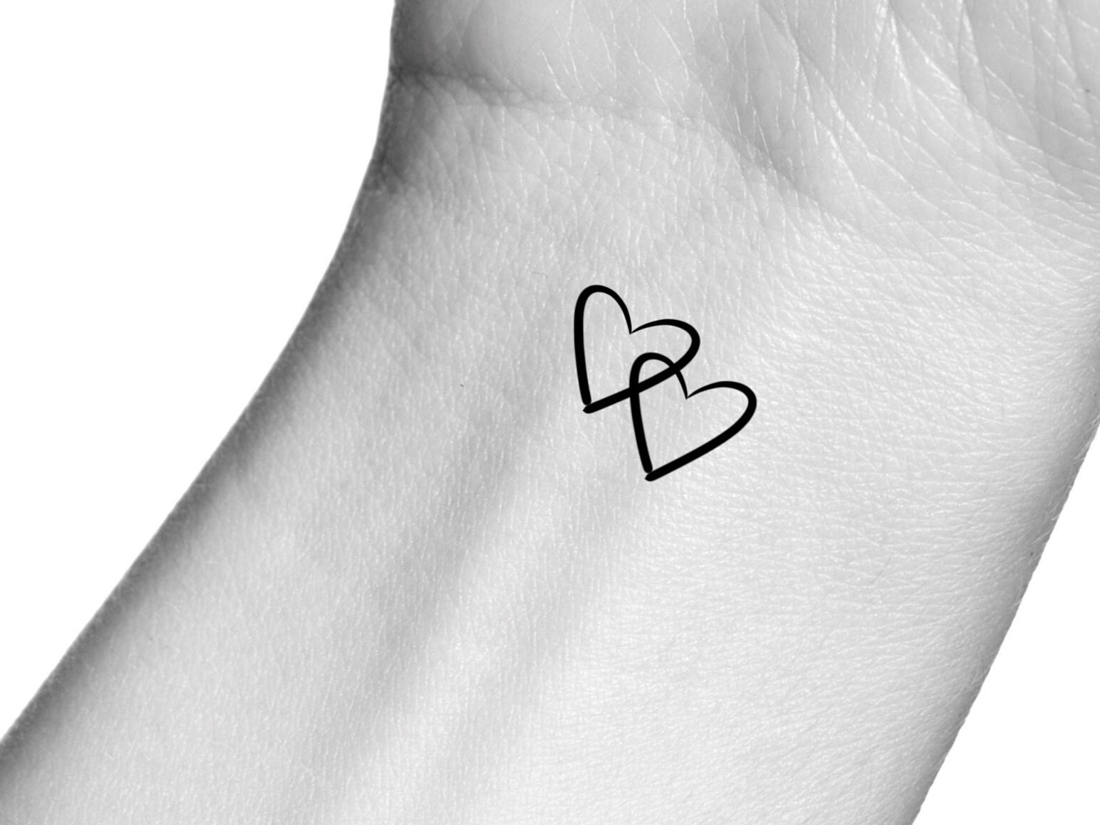 Interlocking Heart Tattoo