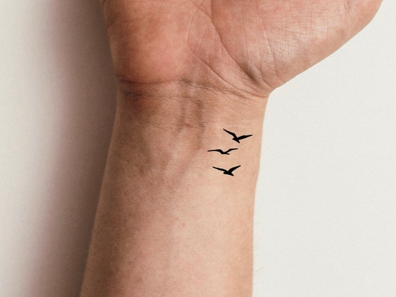 Simple Bird Silhouette Tattoos