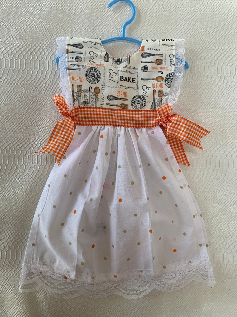 Oven Door Kitchen Towel Dress. Decorated With Ribbons, Lace and Brooch ...