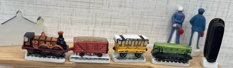 Tiny Train Set: 8 Piece Engine Locomotive Cars Engineer Ticket Taker ...
