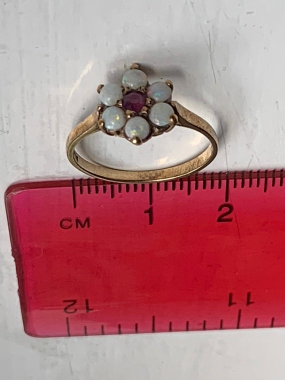 An exquisite unique and rare ruby and opal cluster ri… - Gem