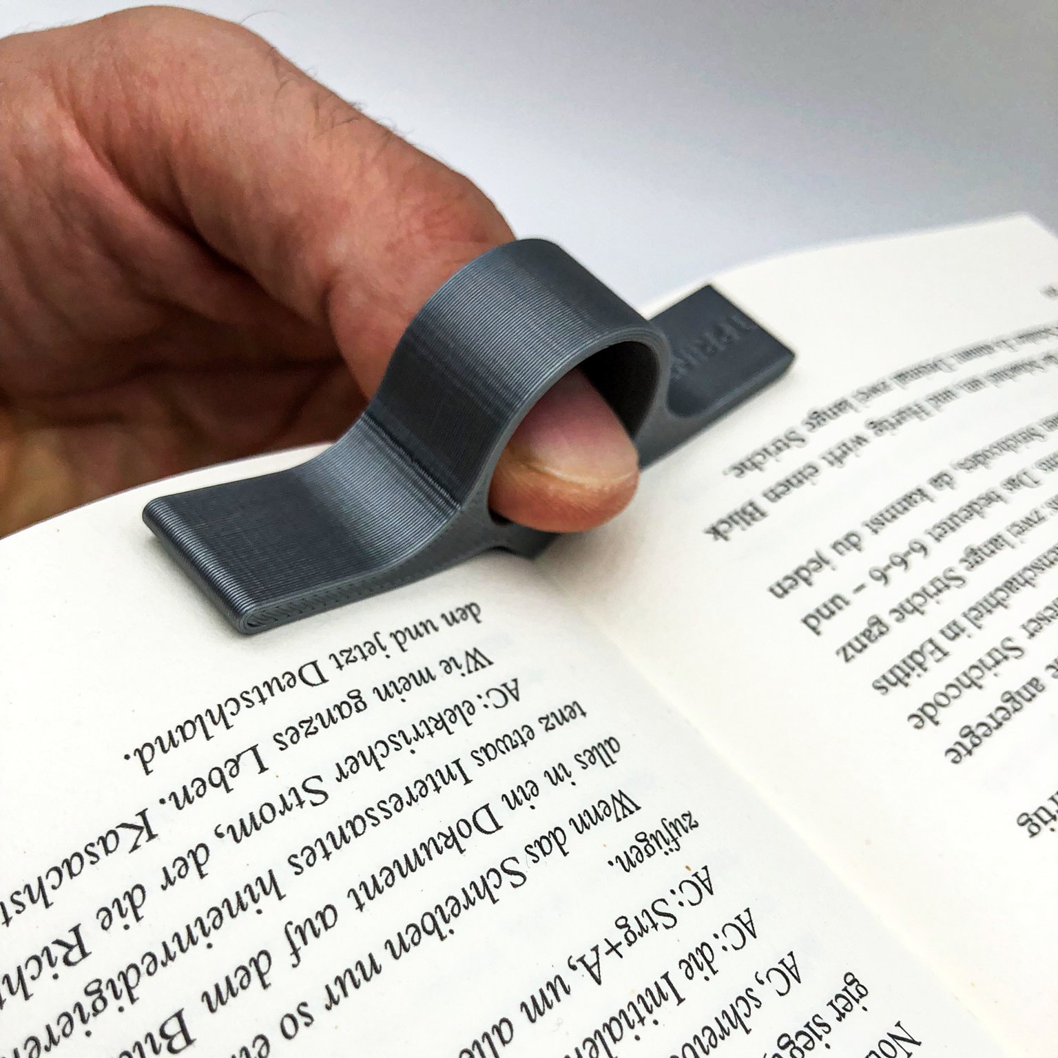 OHBH - One Hand Book Holder - Book Page Holder | Thumb Holder ...