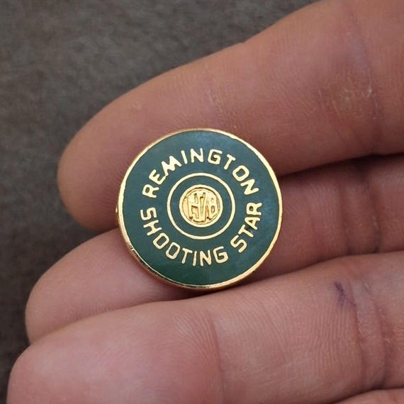 1970s Remington Shooting Star Green Enamel Pin - Gem