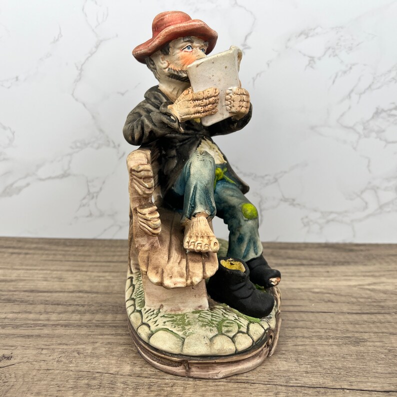 Vintage Unique Man Sitting on a Bench Reading, Beautiful Detailed ...