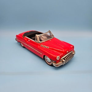 1950's Pressed Steel Buick Toy Car....made in Japan...niftie Fifties ...