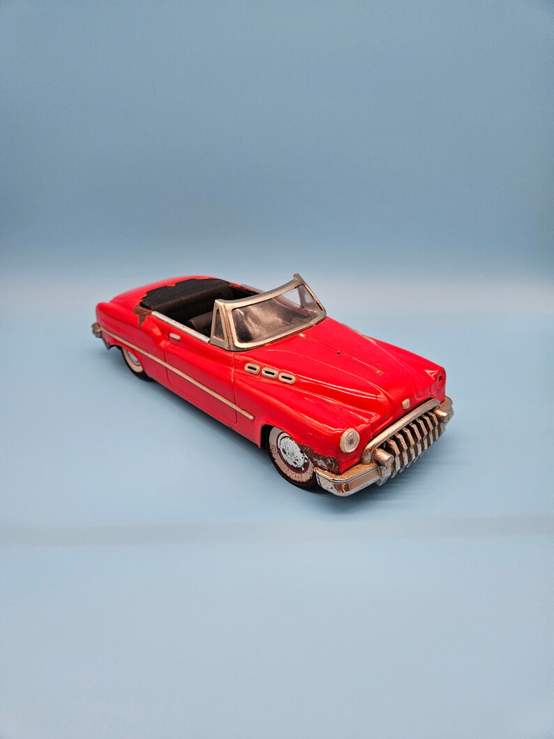 1950's Pressed Steel Buick Toy Car....made in Japan...niftie Fifties ...