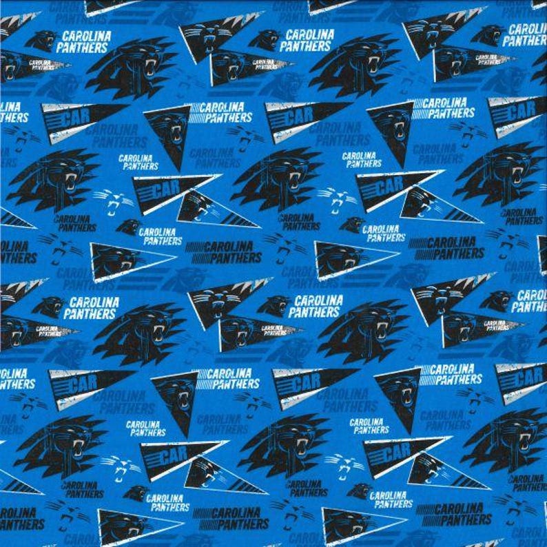 NFL Fabric Carolina Panthers Football in Blue 100% Cotton From Fabric ...