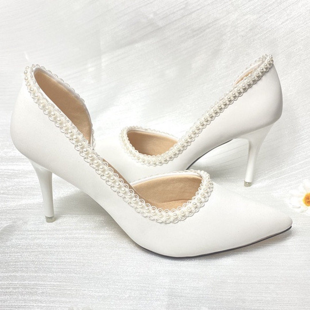 Wedding Shoes Are Decorated With Beautiful Lace Edges. 8cm High Heels ...