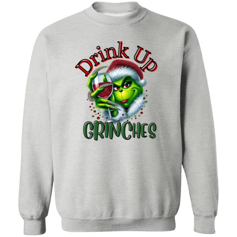Drink up Grinches, a Mischievous, Green Character, Enjoying a Glass of ...