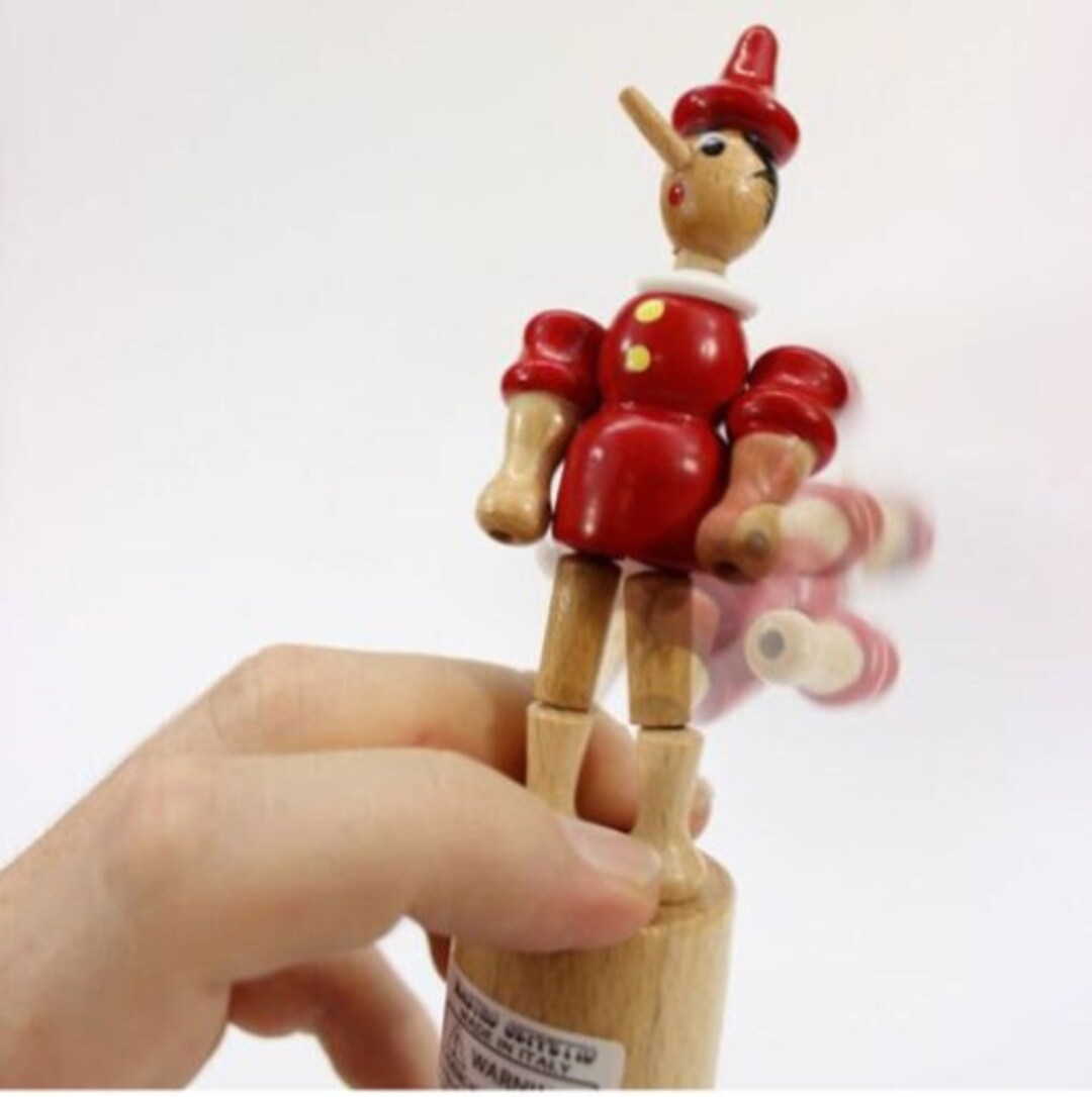 The Classic Pinocchio Thumb Activated Push Button Toy, Figurine With ...