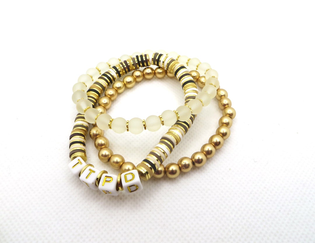 TTPD Collection TTPD Stack Heishi Bracelet Brushed Gold Custom Lyric ...