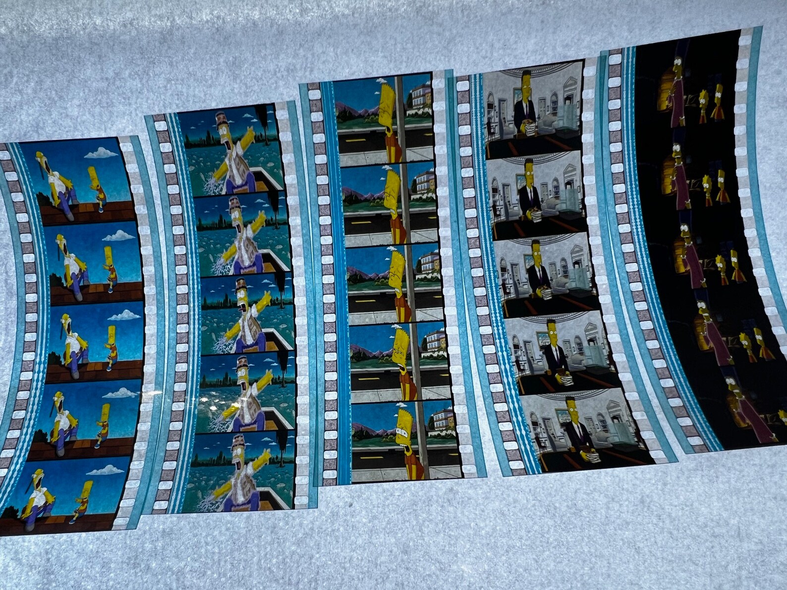 The Simpsons Movie Genuine 35mm Film Cell Strips, 5 Strips of 5 Cells ...
