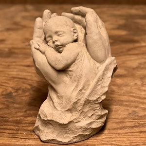 Newborn in Hands Concrete Figurine Sleeping Baby Statue Carrying ...