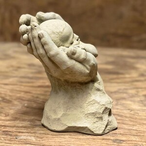 Newborn in Hands Concrete Figurine Sleeping Baby Statue Carrying ...