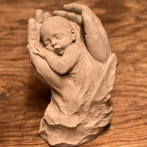 Newborn in Hands Concrete Figurine Sleeping Baby Statue Carrying ...