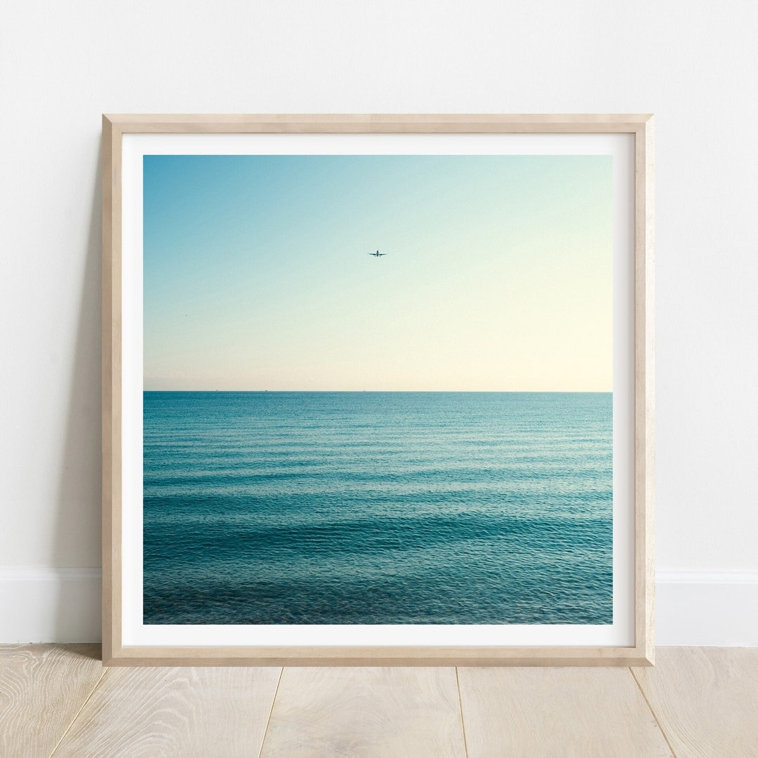 Beautiful Minimal Ocean Scene With an Approaching Plane - Photography ...