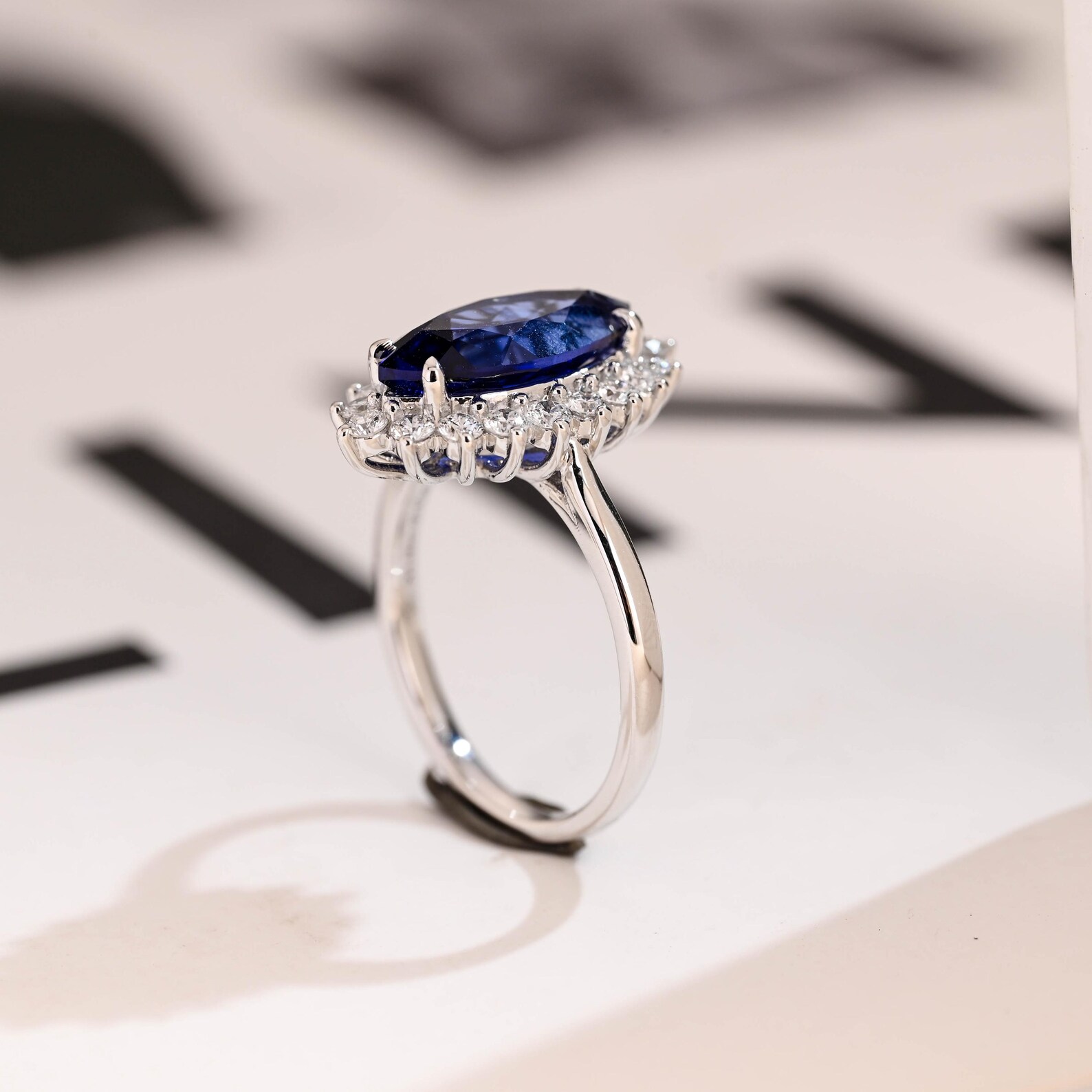Solid Gold Marquise Cut Lab Grown Sapphire Engagement Ring With Halo ...