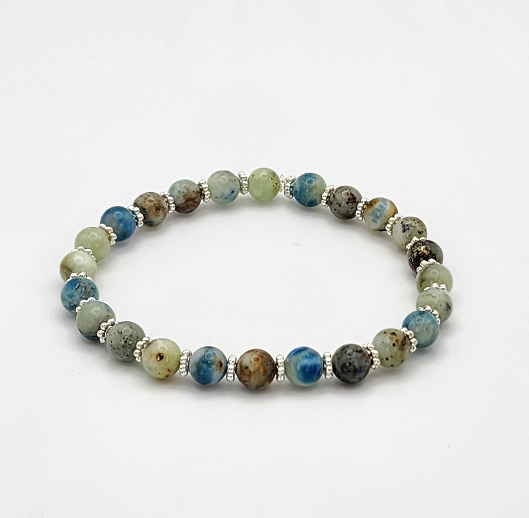 Ethereal Glow: Hackmanite Stretch Bracelet With Silver Accents - UV ...