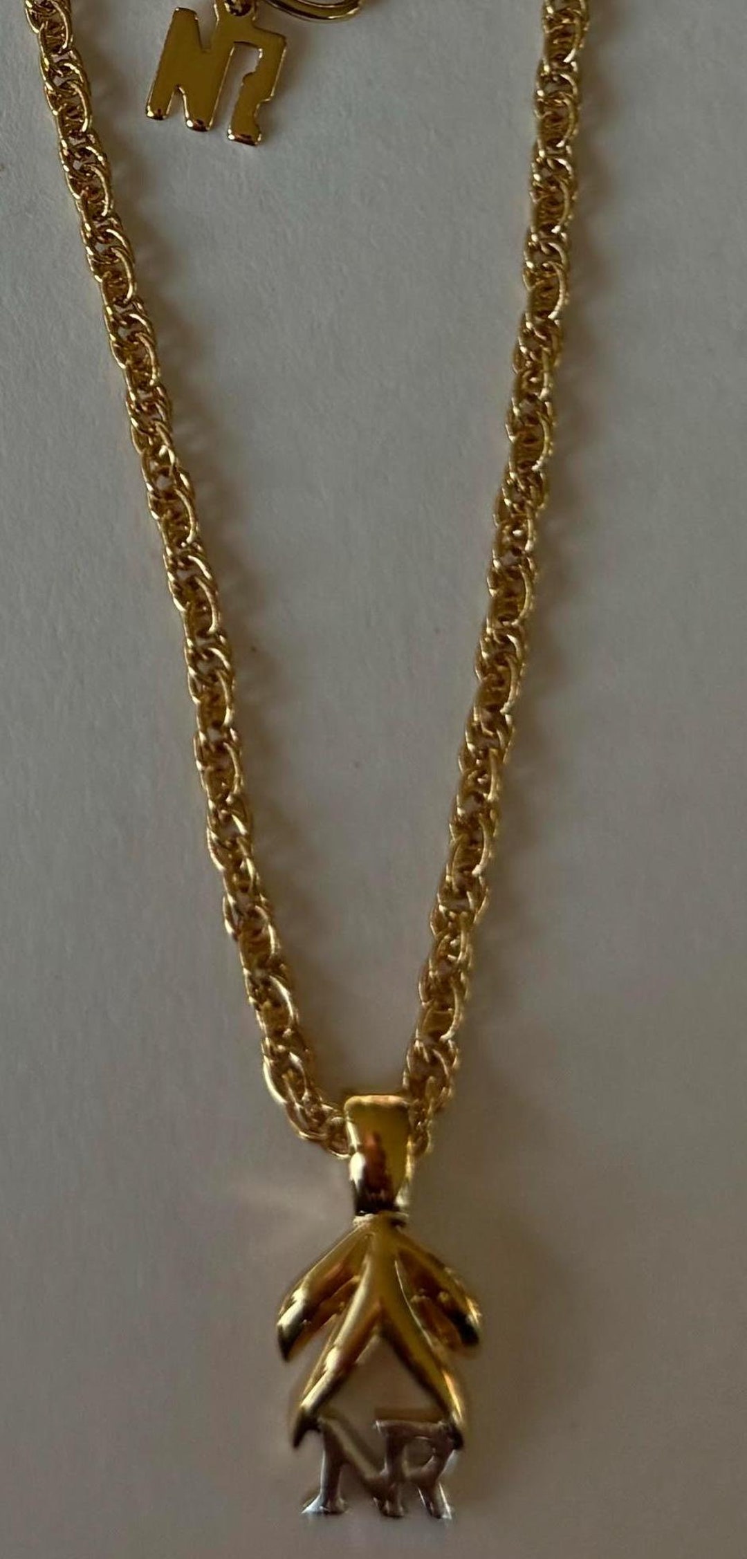 Nina Ricci Logo Pendant, Triple 22kt Gold Plated, Rhodium Accents NR ...