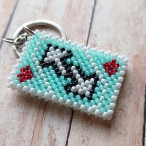 Turquoise Uno Reverse Card Charm - Etsy