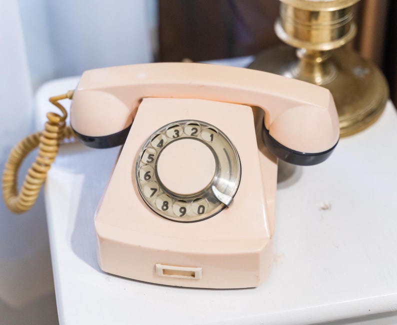 Stationary Landline Phone in Light Pink Color. Old Rotary Dial Vintage ...