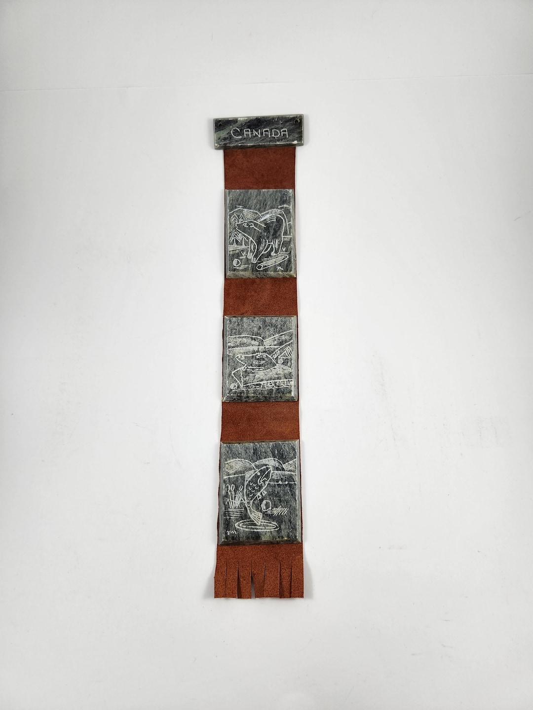 A Vintage Inuit Themed Soapstone Etching Series on Leather by DIMU ...