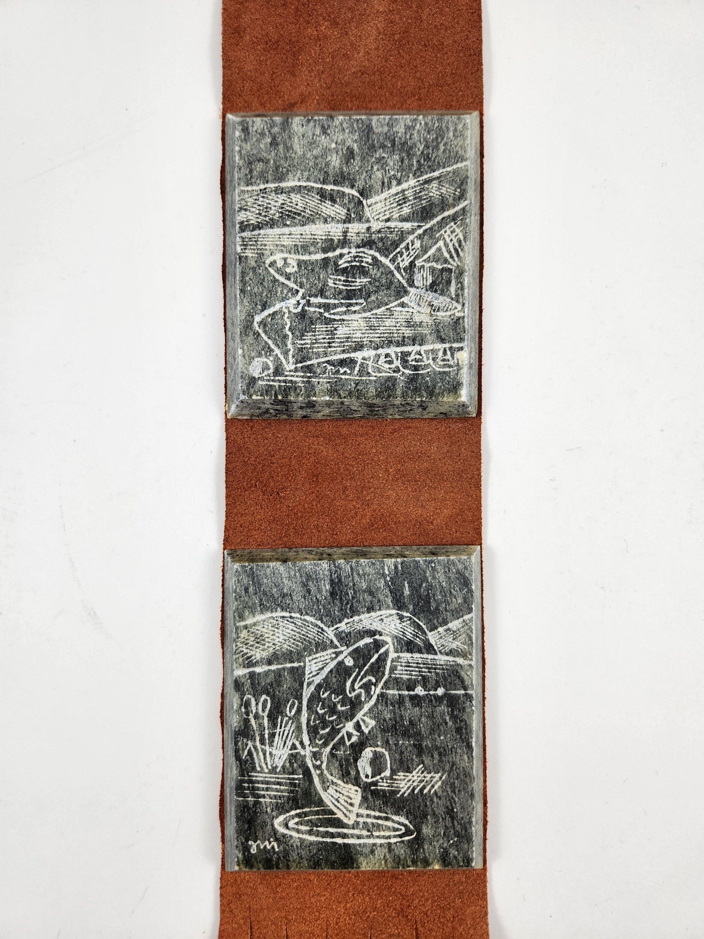 A Vintage Inuit Themed Soapstone Etching Series on Leather by DIMU ...