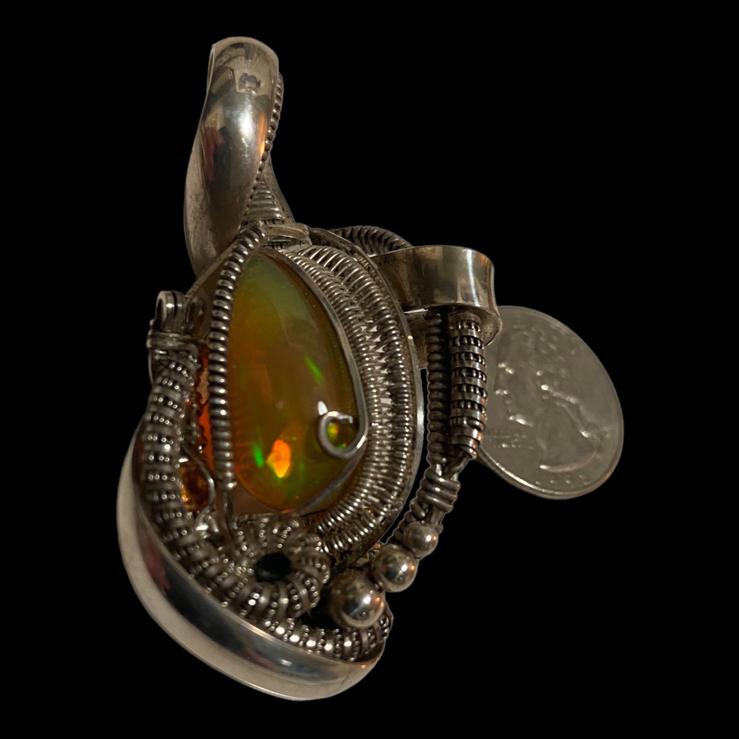 Ethiopian Opal With Colombian Emerald in Coil at Bottom With Hessonite ...