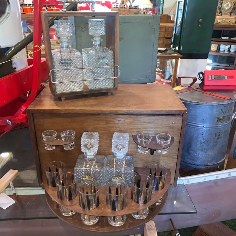 Mid Century “hidden” Bar and English Decanters Tantalus Set Home ...