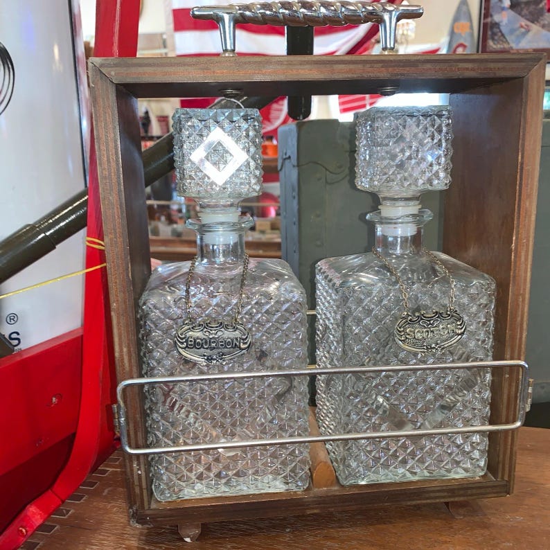 Mid Century “hidden” Bar and English Decanters Tantalus Set Home ...