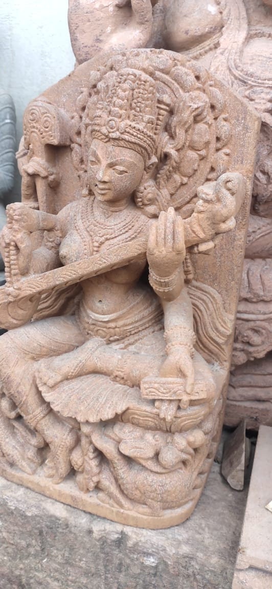 Stone Sitting Saraswati Statue in Red Natural Stone - Etsy