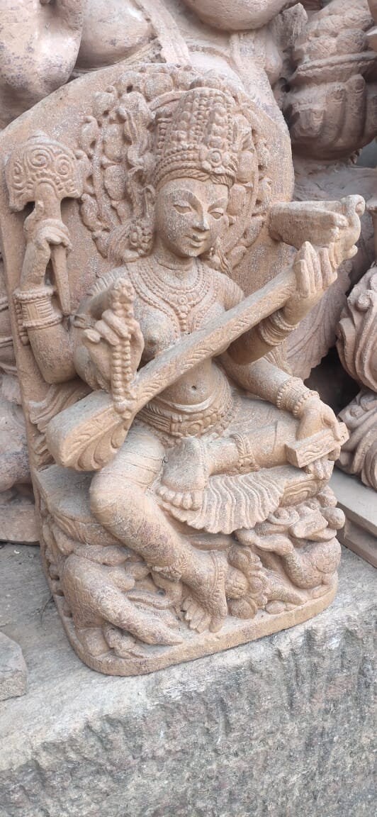 Stone Sitting Saraswati Statue in Red Natural Stone - Etsy