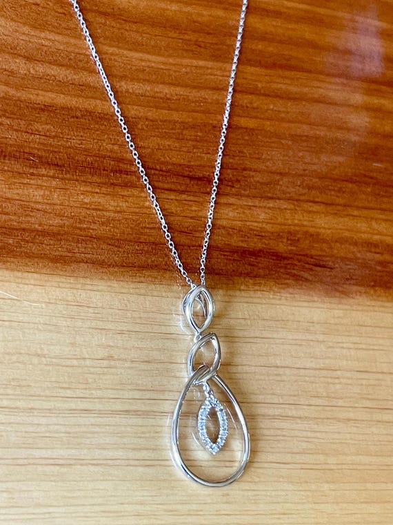 14Kt white gold and natural diamonds movement pendant… - Gem