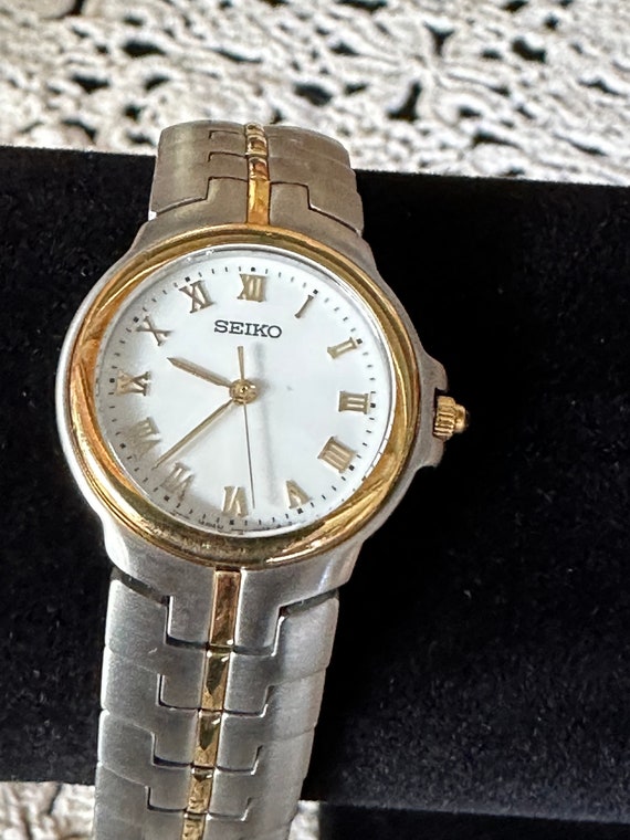 Seiko stainless 18k bezel women’s watch - Gem