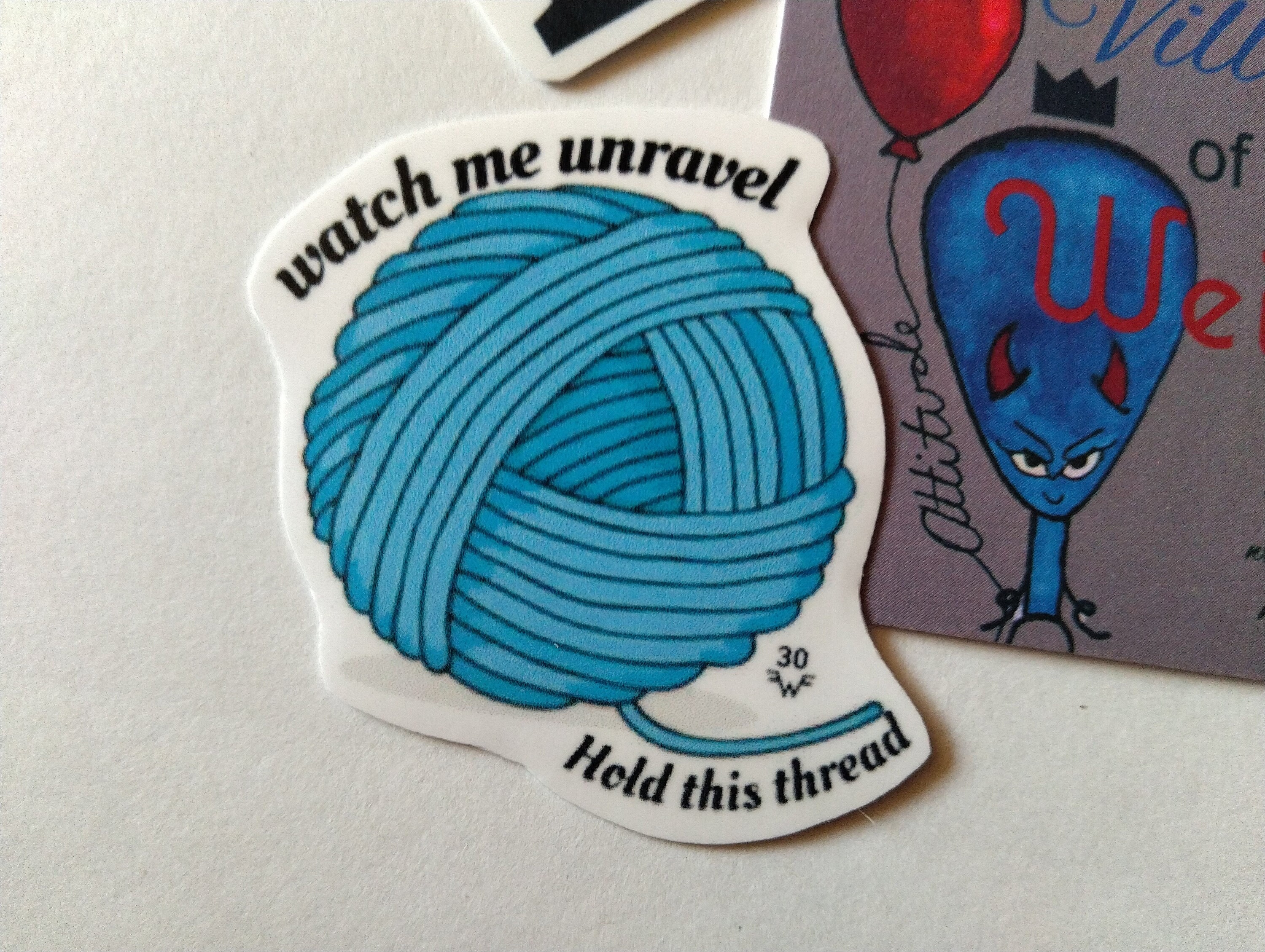 Weezer - the Sweater Song - Sticker - Watch Me Unravel - Village of the ...