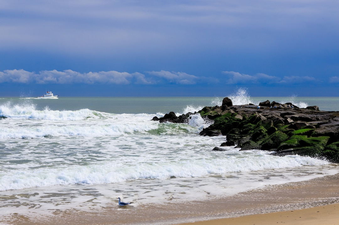 New Jersey Beach Scene, Summertime With Boat and Rocky Shore. Vacation ...