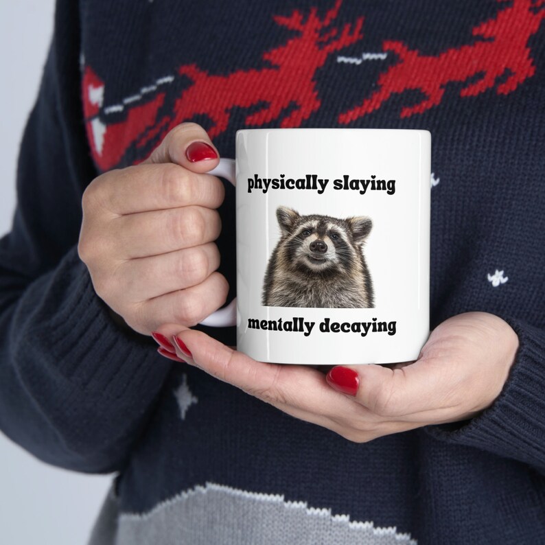 Raccoon Meme Physically Slaying Mentally Decaying 11 Oz Ceramic Mug ...