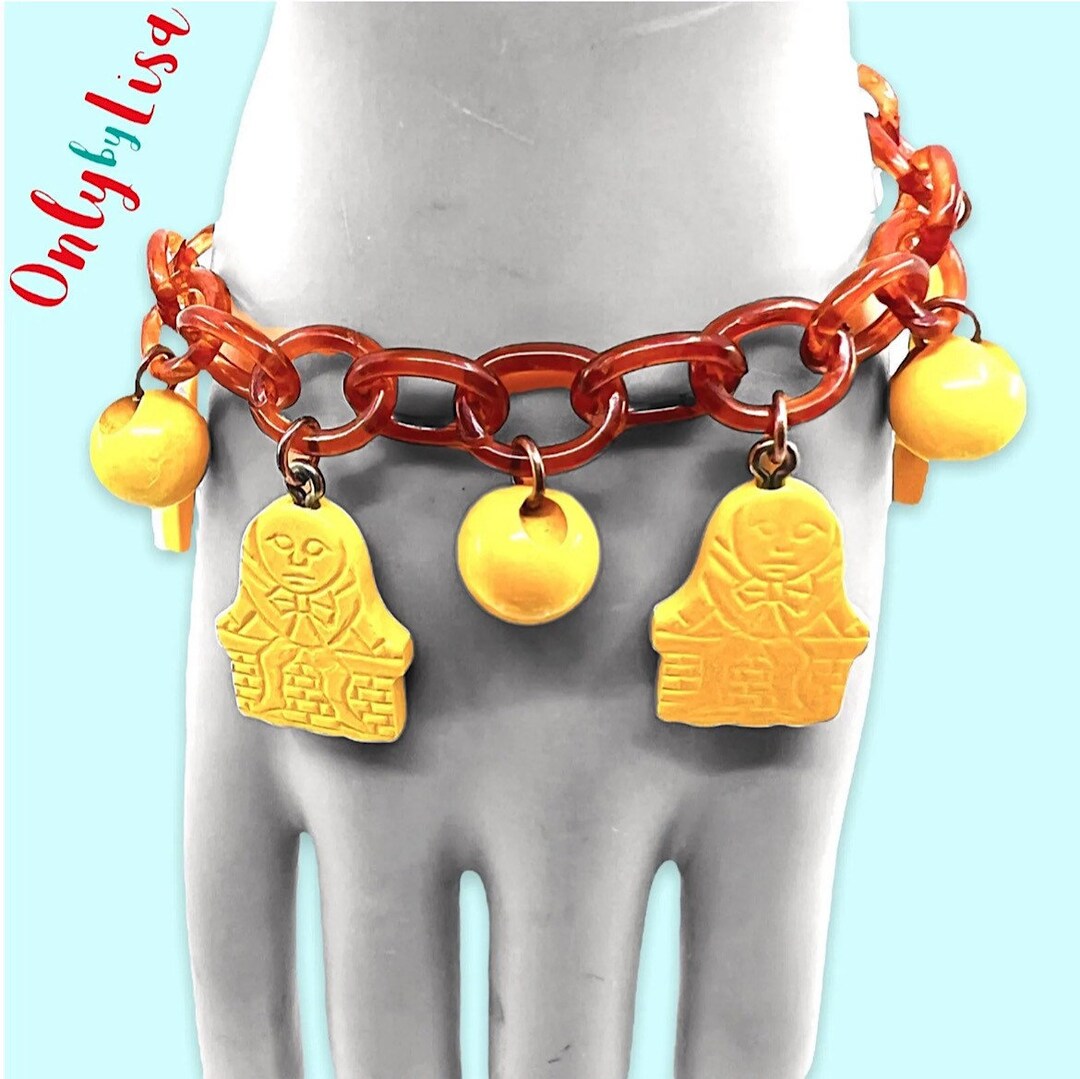 Butterscotch Bakelite Humpty Dumpty Charm Bracelet With Celluloid Chain ...