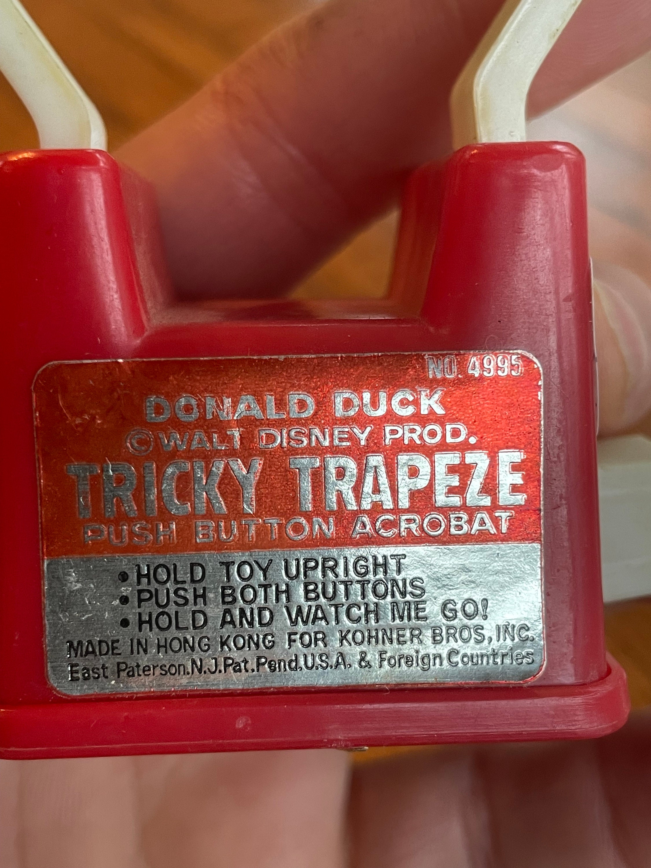 Donald Duck Tricky Trapeze Push Button Vintage Toy still - Etsy