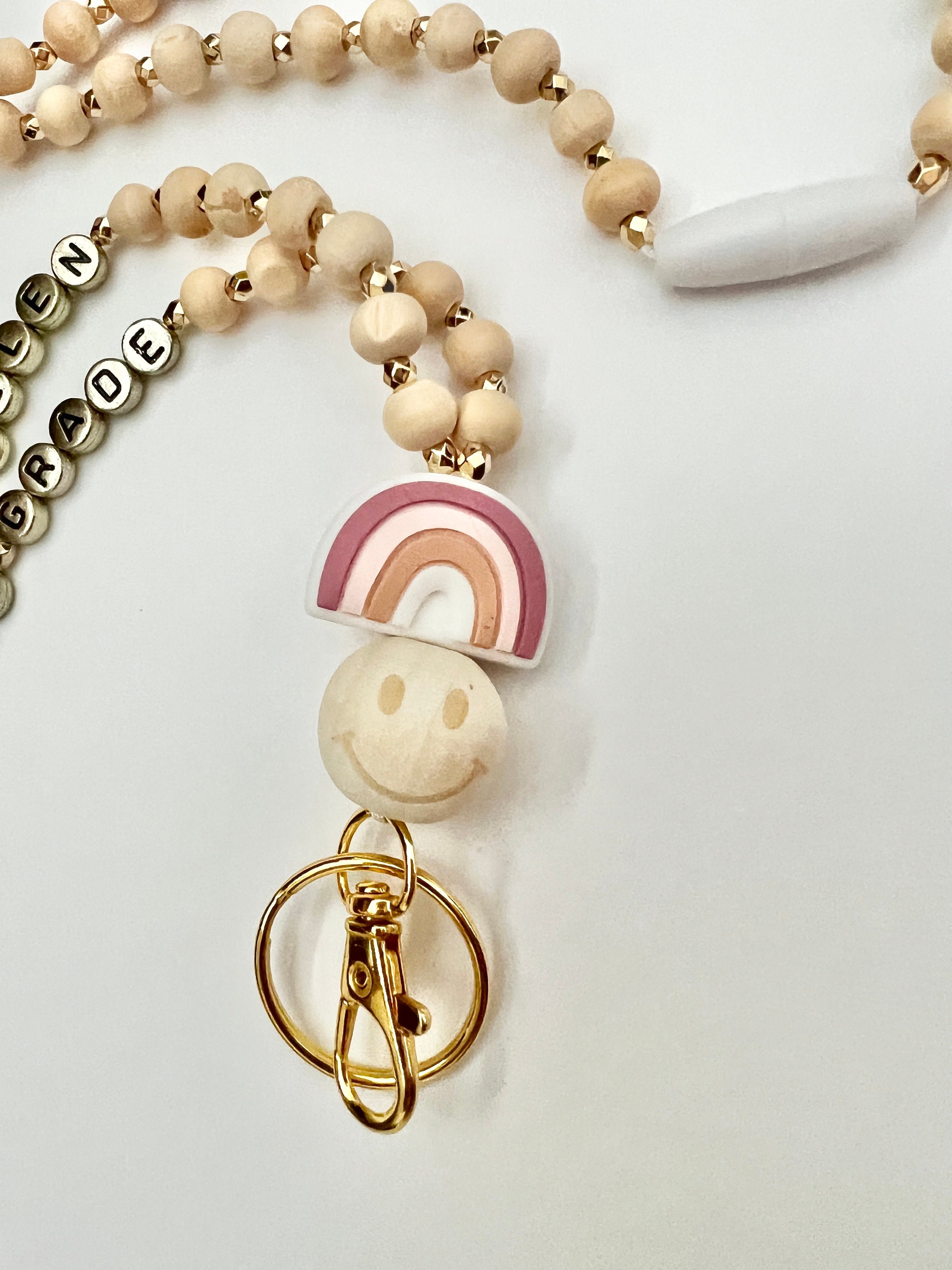 Neutral Rainbow Smiley Lanyard Gold Colored Letters Modern Lanyard ...