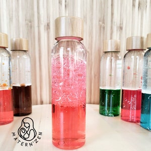Botella sensorial líquida de la calma Lampara de lava Montessori ...