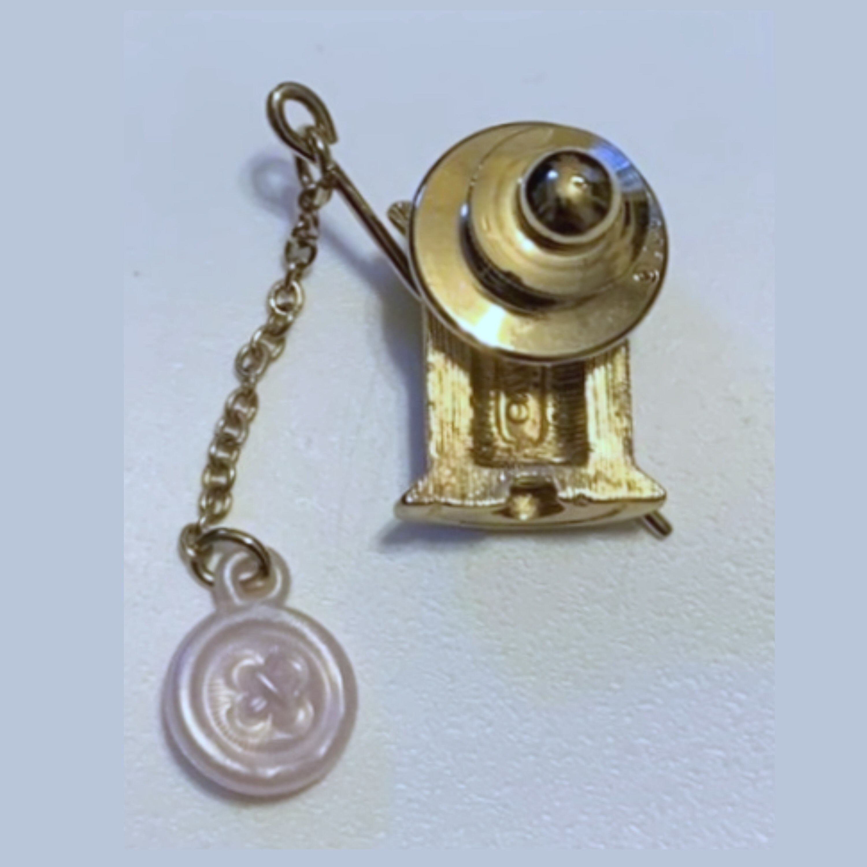 Avon Spool of Thread & Pink Button Dangling From A Sewing Needle Gold ...