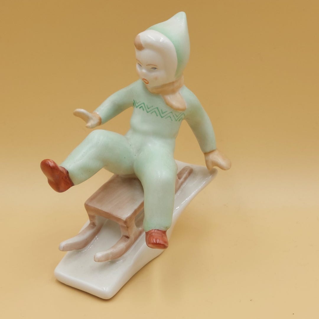 BOY ON SLED- Vintage Porcelain Fun in the Snow Figurine- by Aurél ...