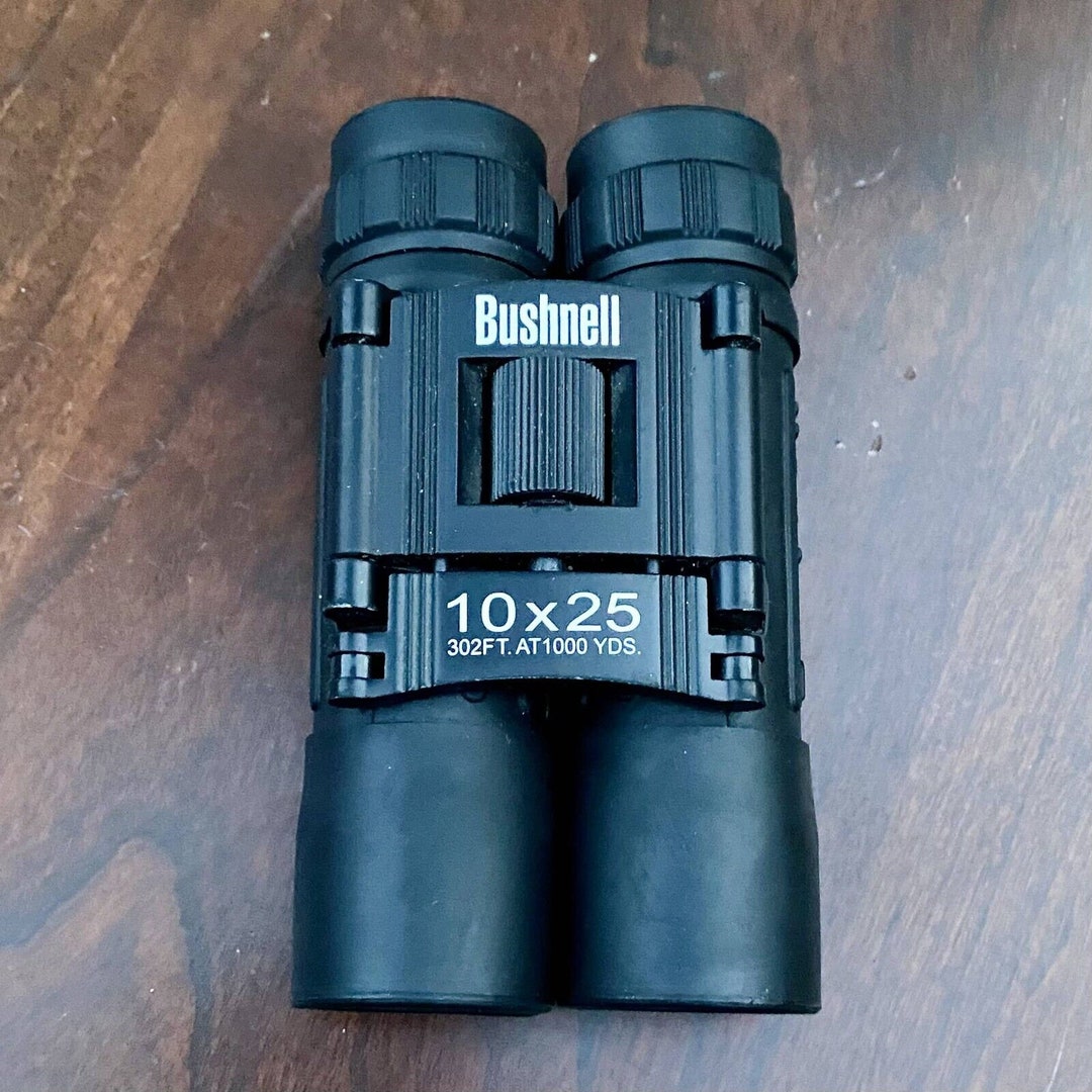 Bushnell 10x25 Black Compact Folding Binoculars 302-FT. AT 1000-YDS - Etsy