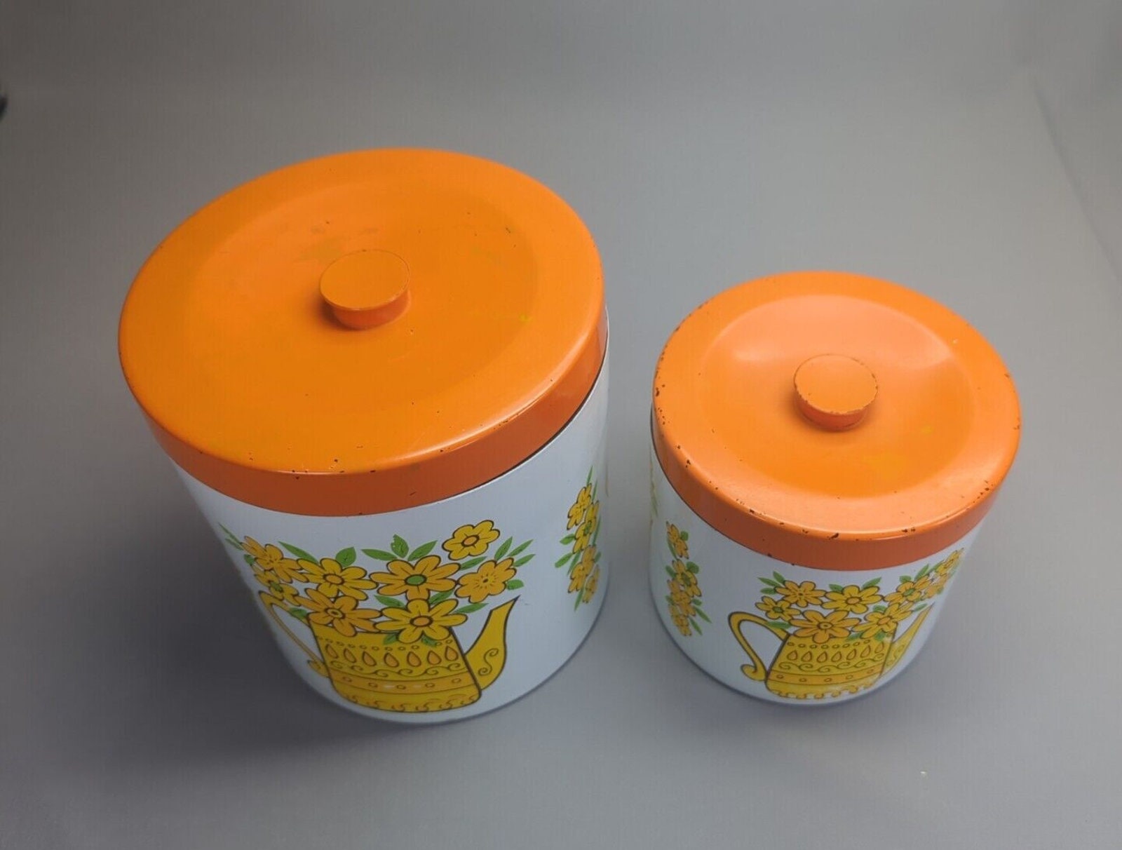 Set of Two Retro Floral and Water Can Design Tin Cannisters 6 1/2 and 5 ...