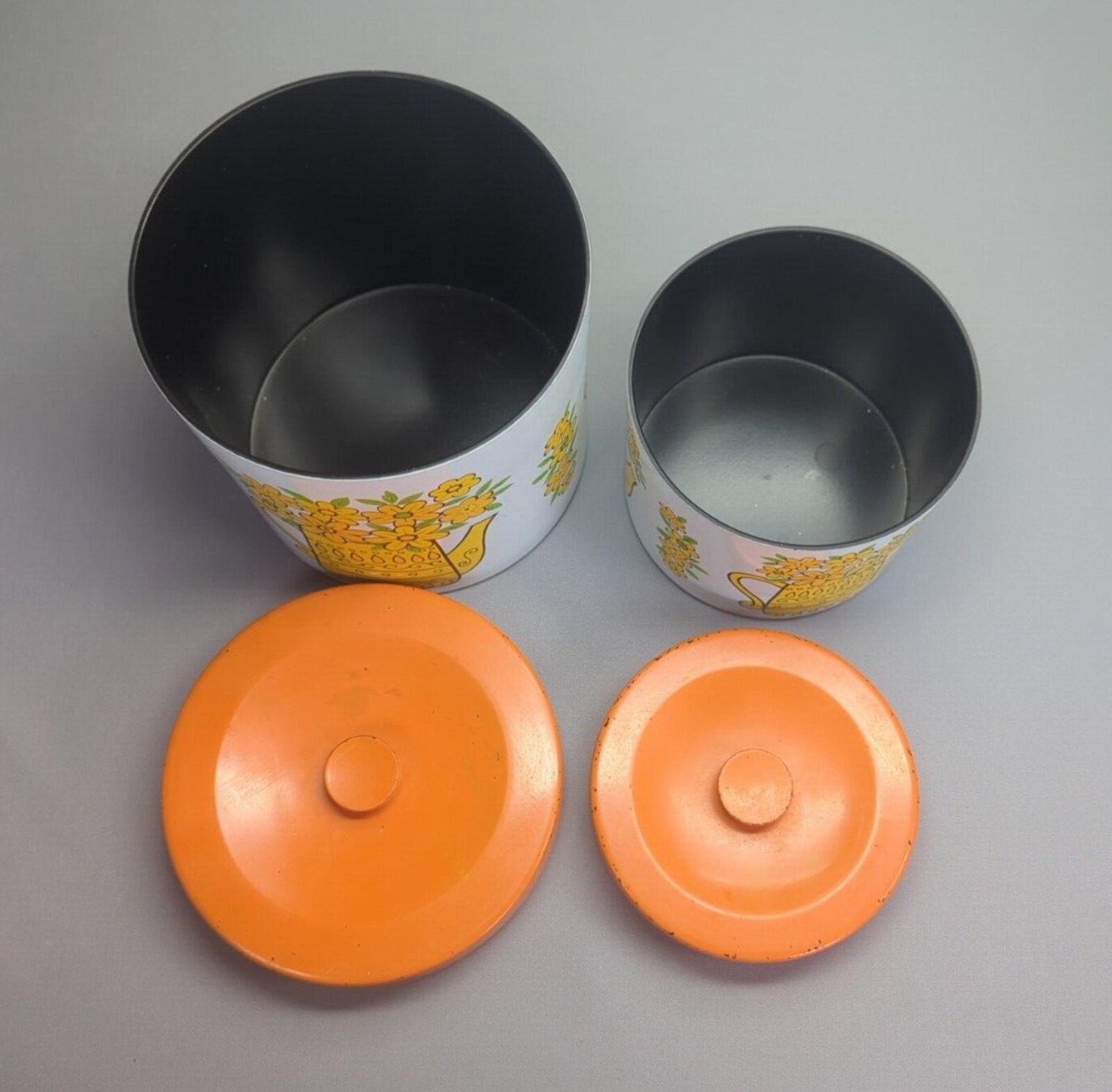 Set of Two Retro Floral and Water Can Design Tin Cannisters 6 1/2 and 5 ...